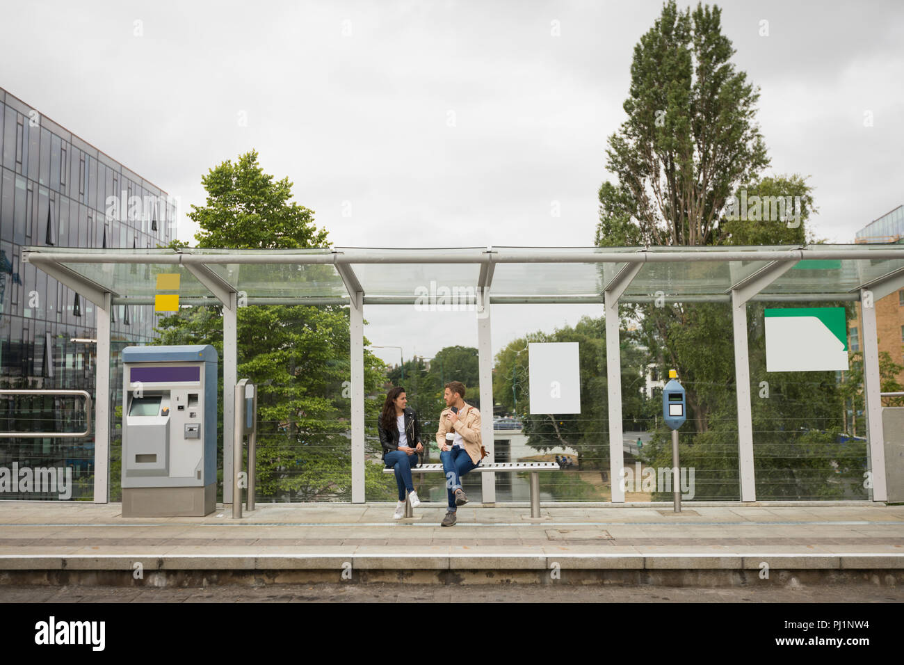 Couple interacting with each other in platform Stock Photo - Alamy