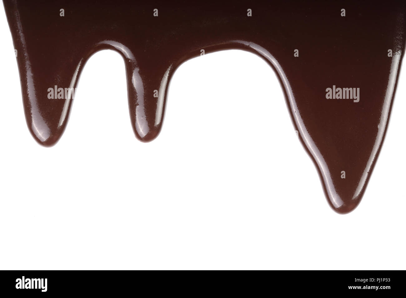 Melted chocolate dripping isolated on white background Stock Photo - Alamy