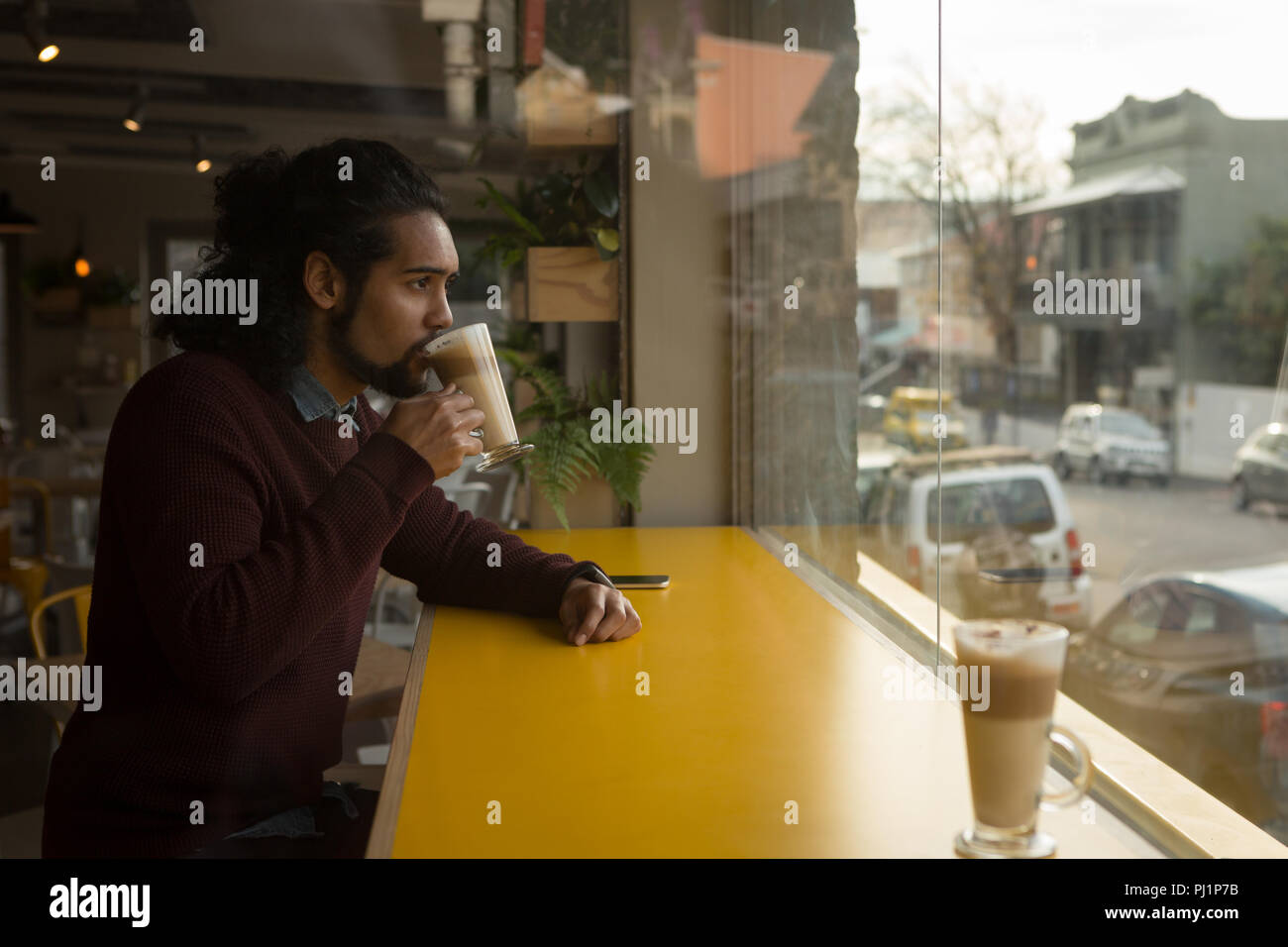 Man cafe thinking hi-res stock photography and images - Alamy