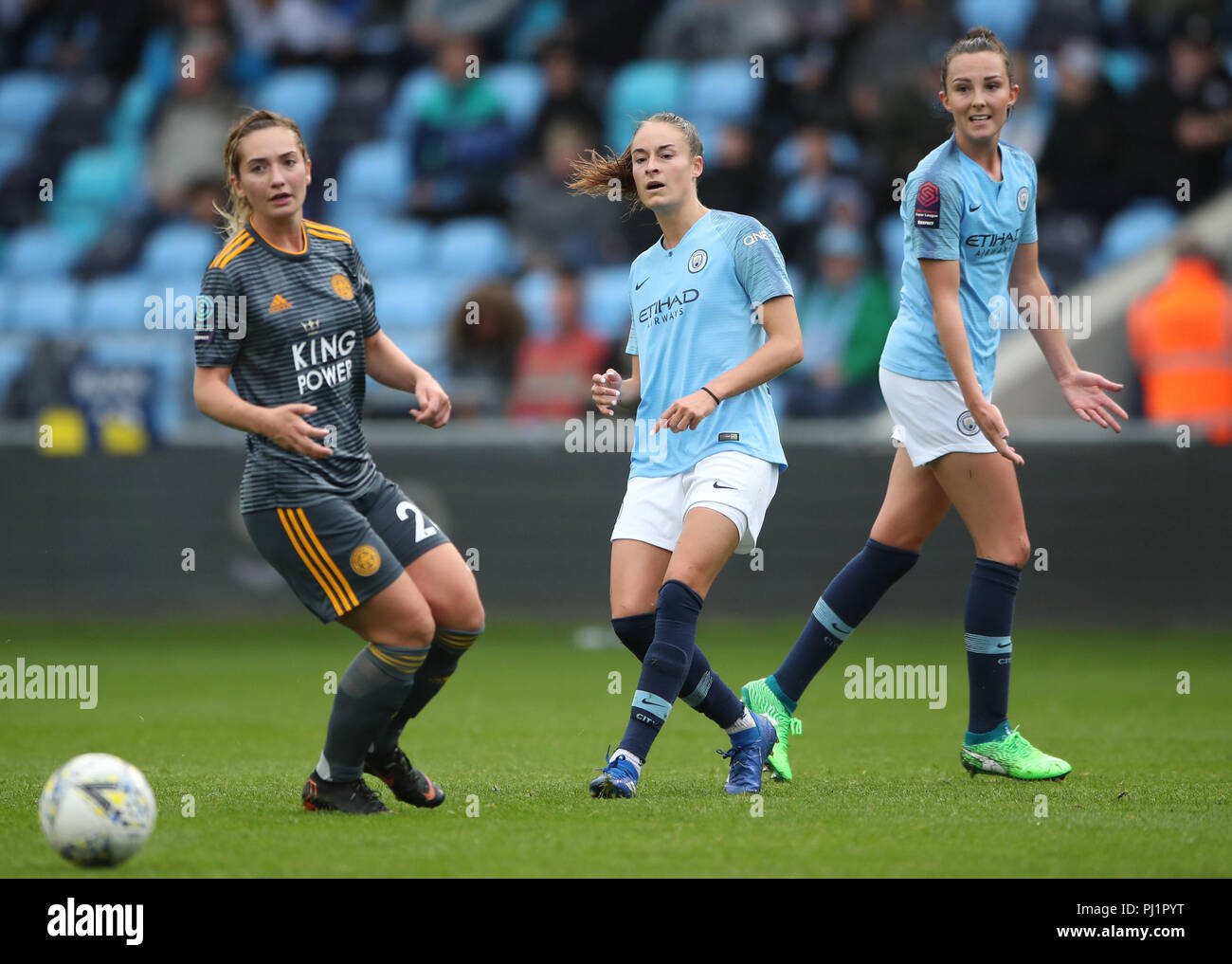 Manchester City Women's Tessa Wullaert (centre) make a pass past ...