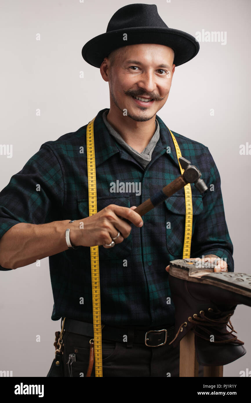 Happy shoemaker hi-res stock photography and images - Alamy
