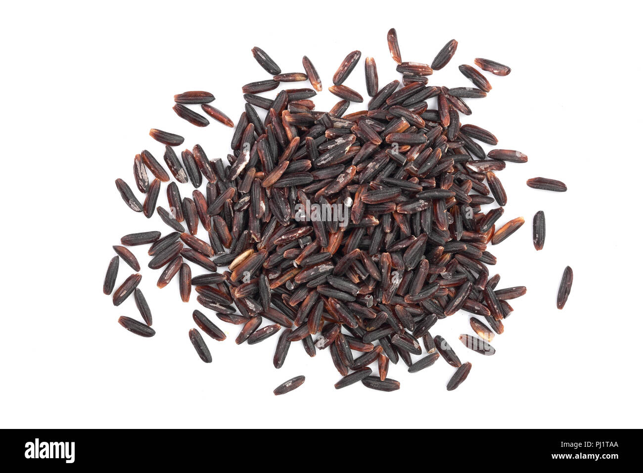 Black wild rice isolated on white background close up. Top view. Flat ...