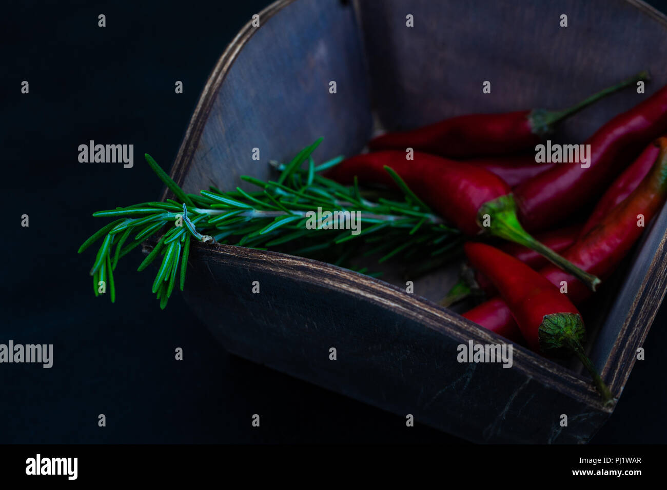 Organic food cooking concept with fresh spices on dark background with ...