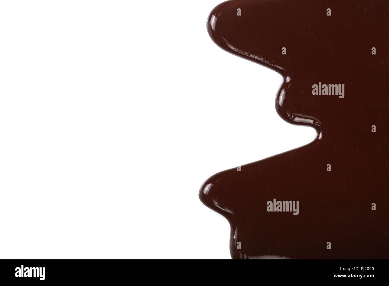 Melted chocolate dripping isolated on white background Stock Photo - Alamy