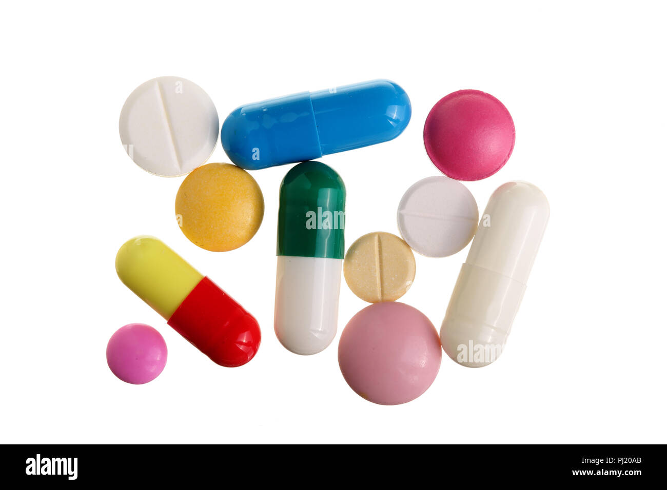 colorful pill capsule isolated on white background. Top view. Flat lay ...