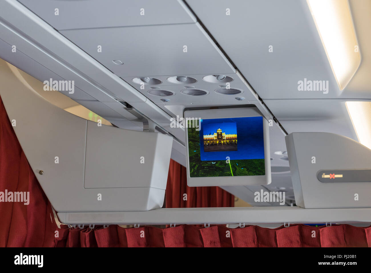 ATHENS, GREECE - May 25, 2017: Interior of aircraft, in-flight monitor ...
