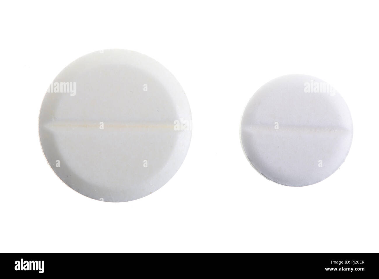 white pill capsule isolated on white background macro. Top view. Flat ...