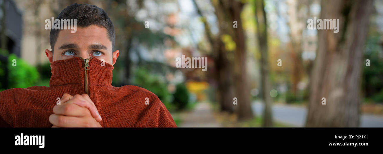 Composite image of man shivering from cold Stock Photo - Alamy