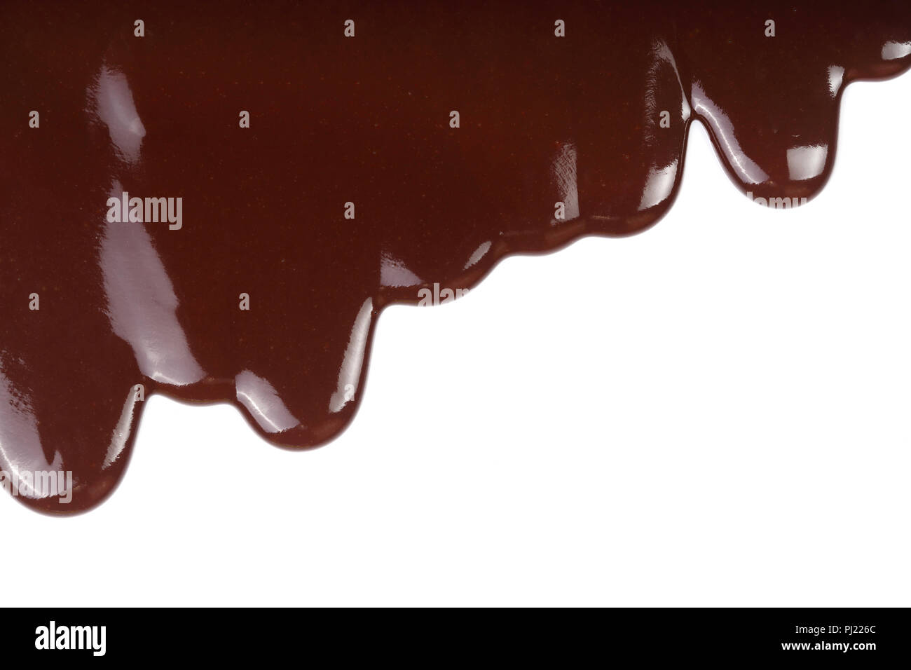 Melted chocolate dripping isolated on white background Stock Photo - Alamy