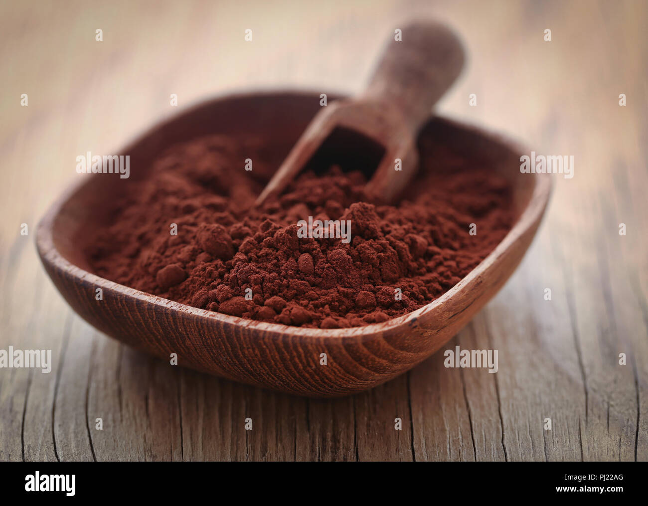 Cacao or cocoa powder on a natural surface Stock Photo - Alamy