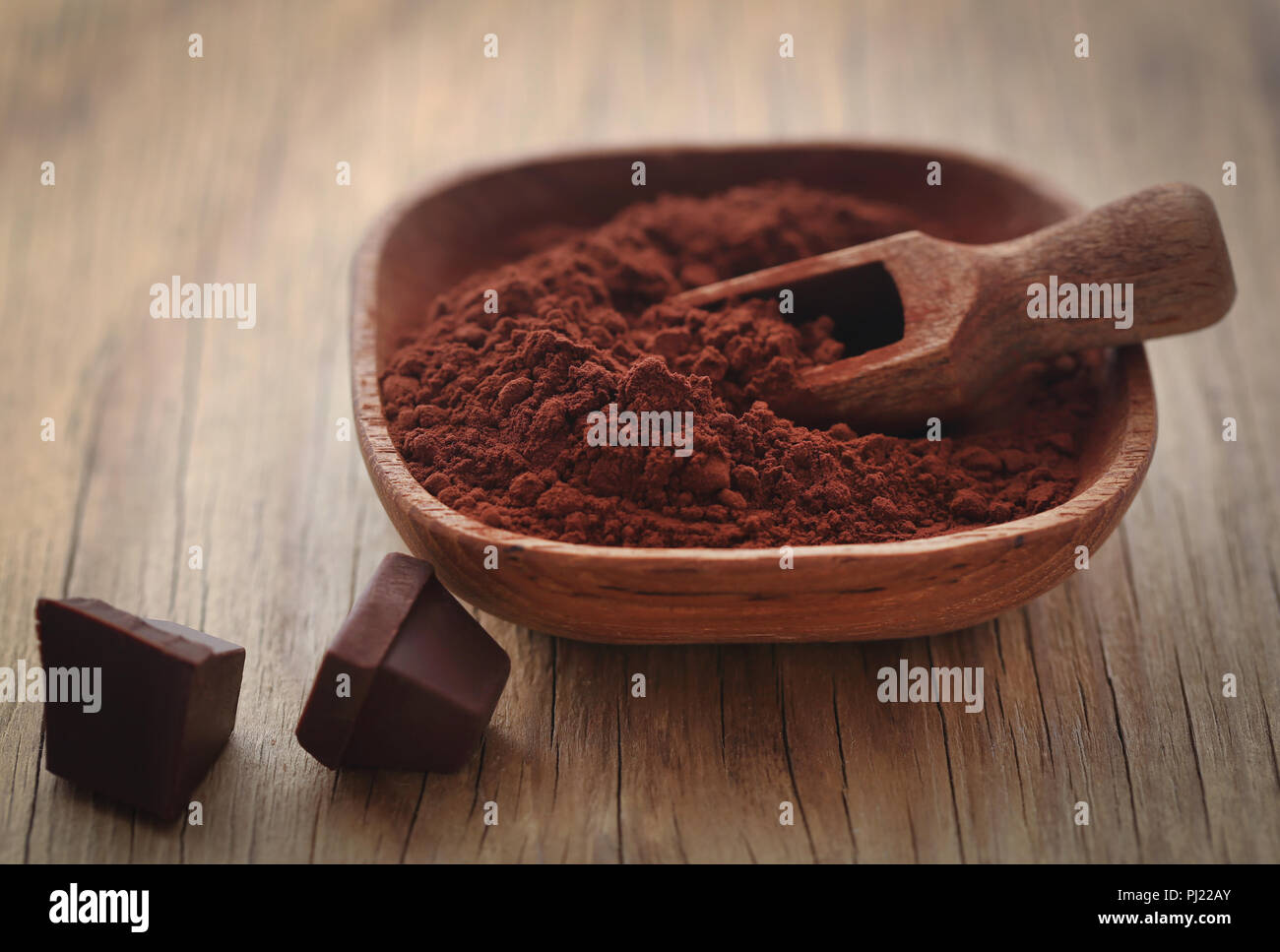 Cacao or cocoa powder on a natural surface Stock Photo - Alamy