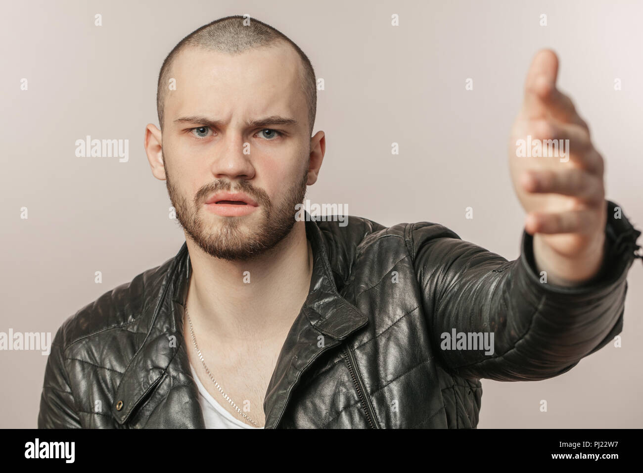 Beckoning hand sign hi-res stock photography and images - Alamy