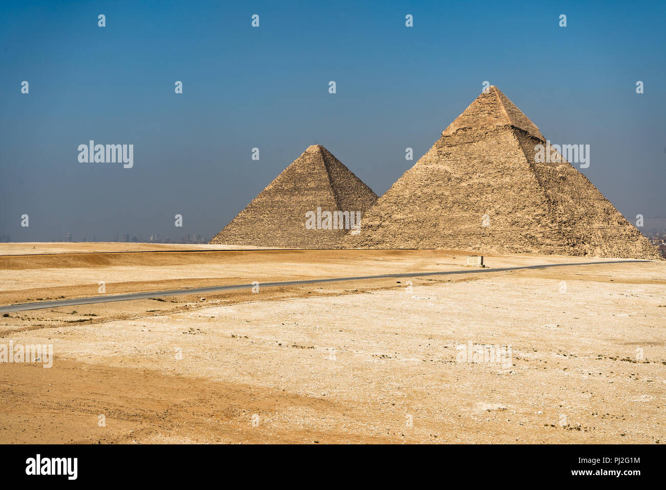 Egyptian pyramids on sky background Stock Photo - Alamy