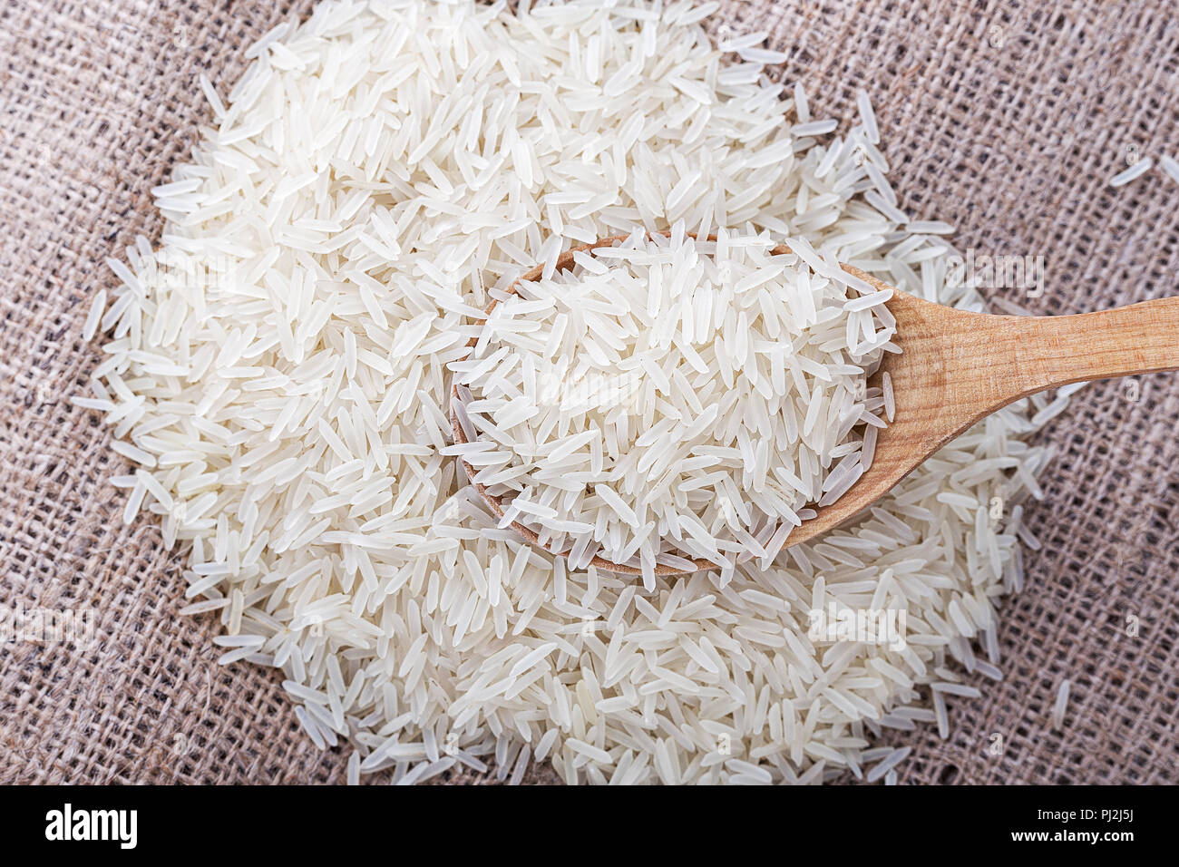 Open bag of uncooked rice hi-res stock photography and images - Alamy