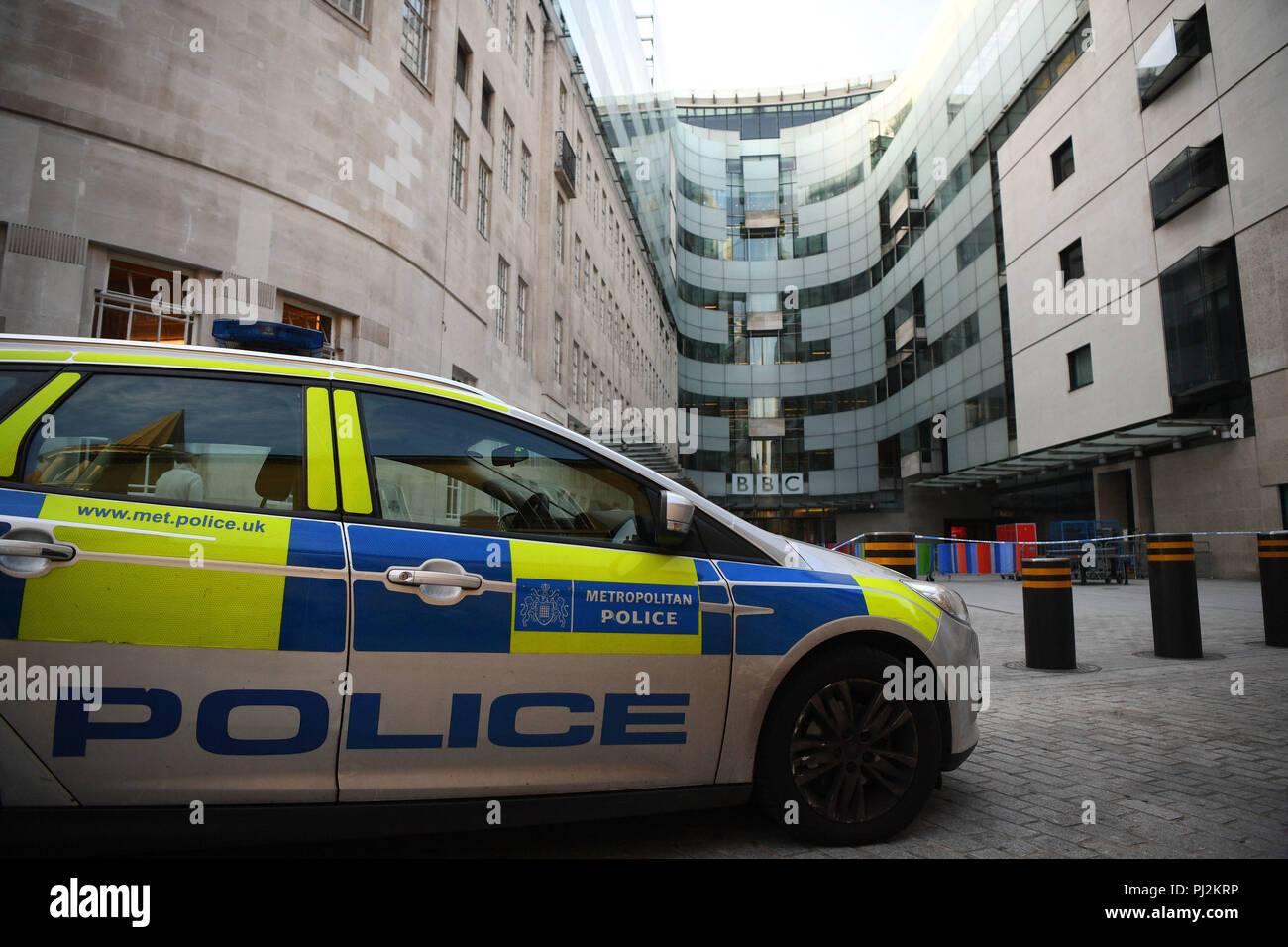 A police car outside of BBC Broadcasting House, on Portland Place ...