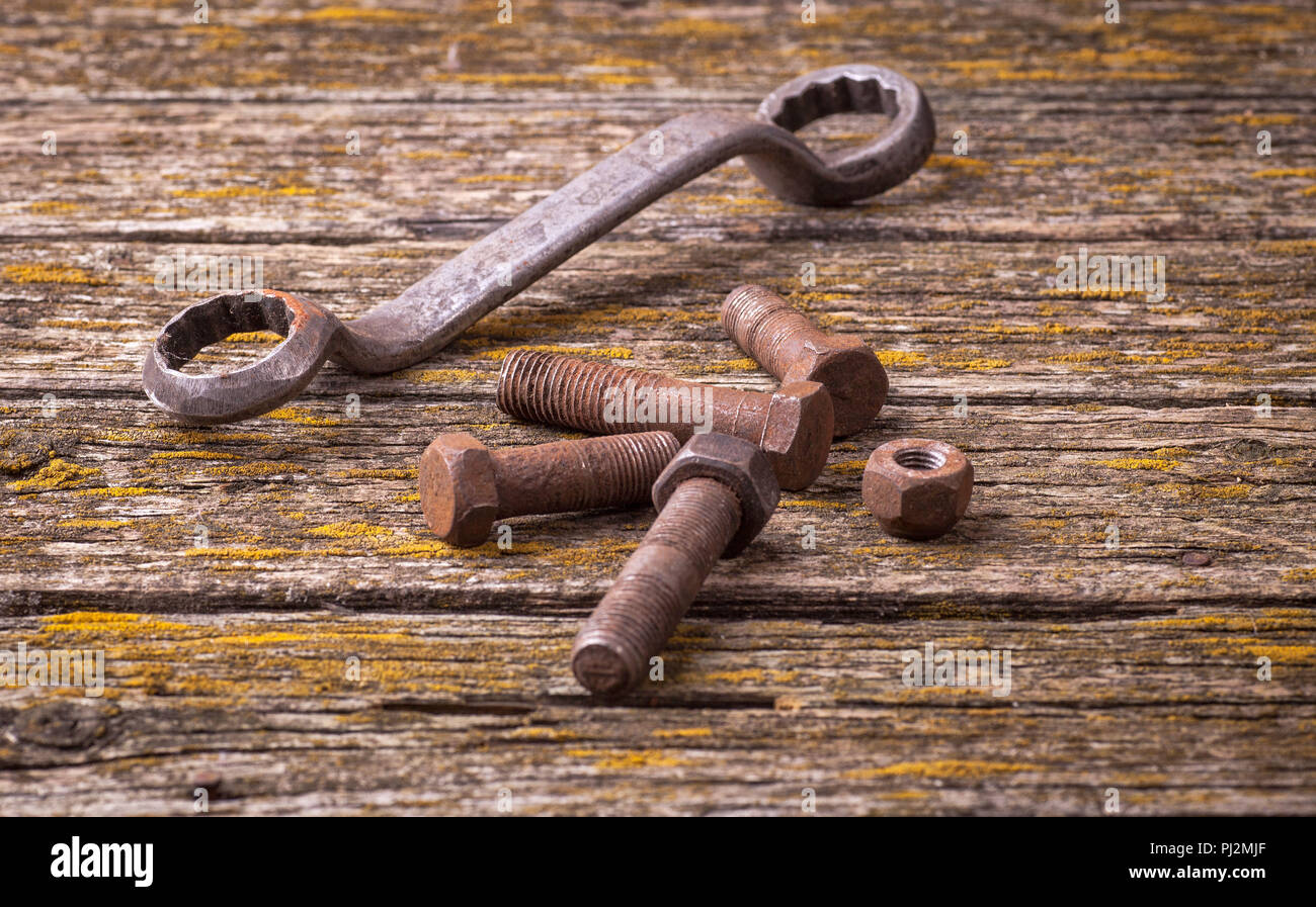 Old rusty nuts, bolts. Ancient tools. A dream of old molded boards ...