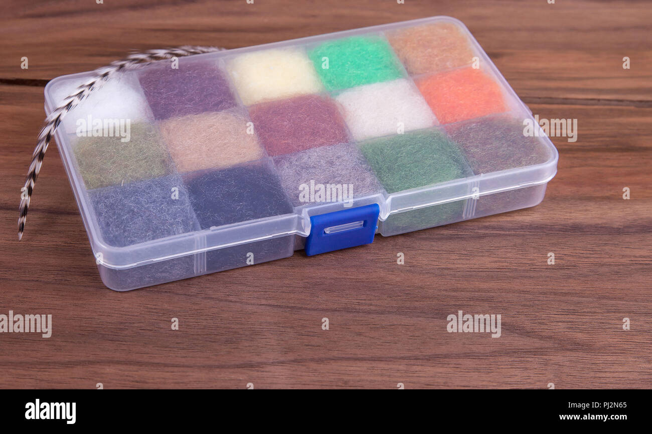 Various materials for knitting insects. Feathers, fur, thread Stock ...