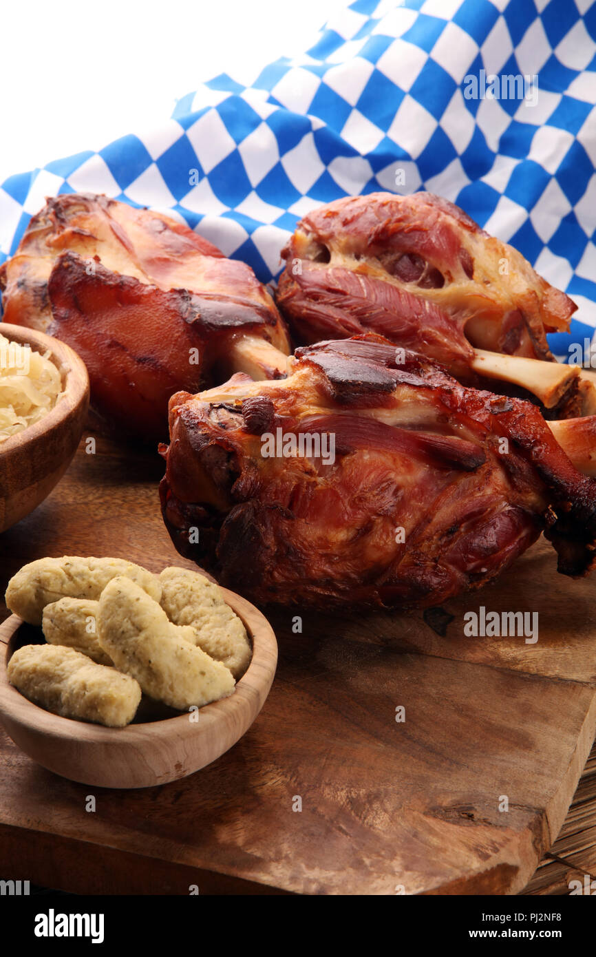 Roasted pork knuckle. Ham and bacon are popular foods in the west ...
