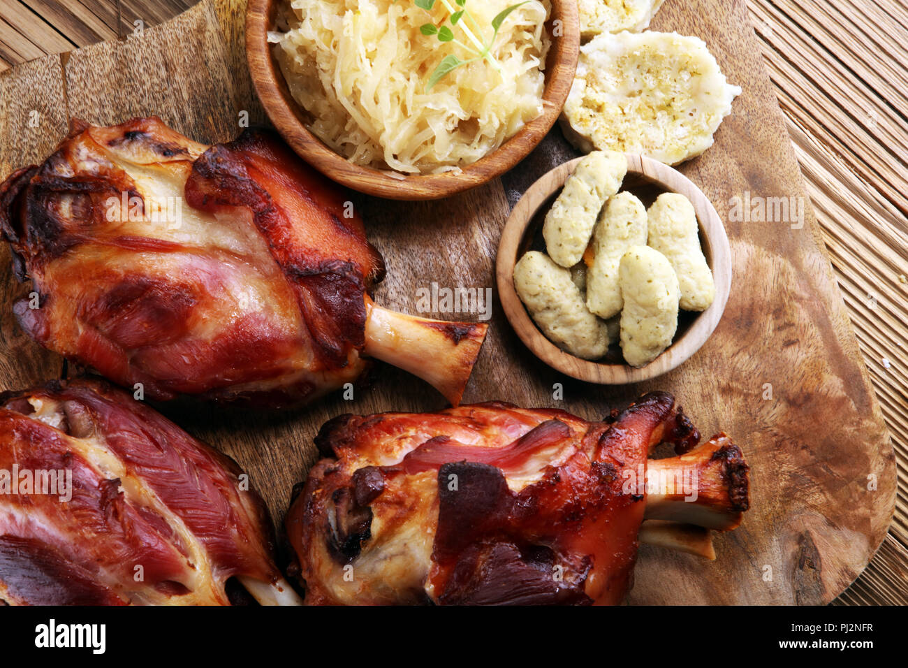 Roasted pork knuckle. Ham and bacon are popular foods in the west ...