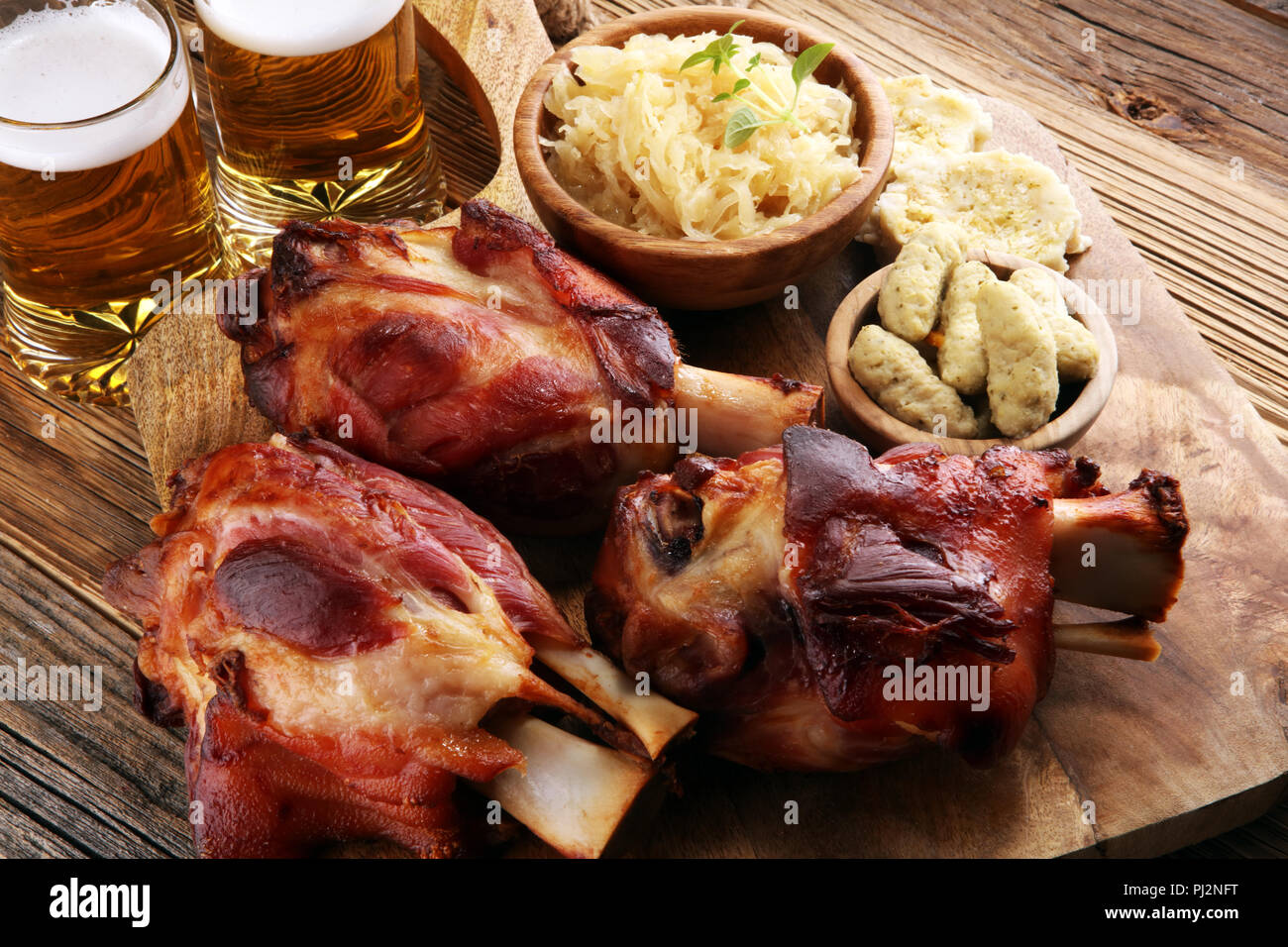 Roasted pork knuckle. Ham and bacon are popular foods in the west ...