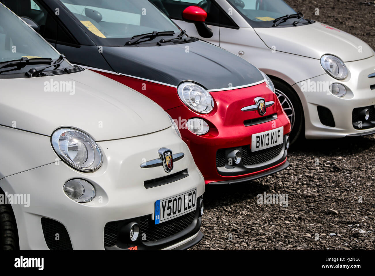 A row of three Fiat Abarth 500 hatchback cars Stock Photo - Alamy