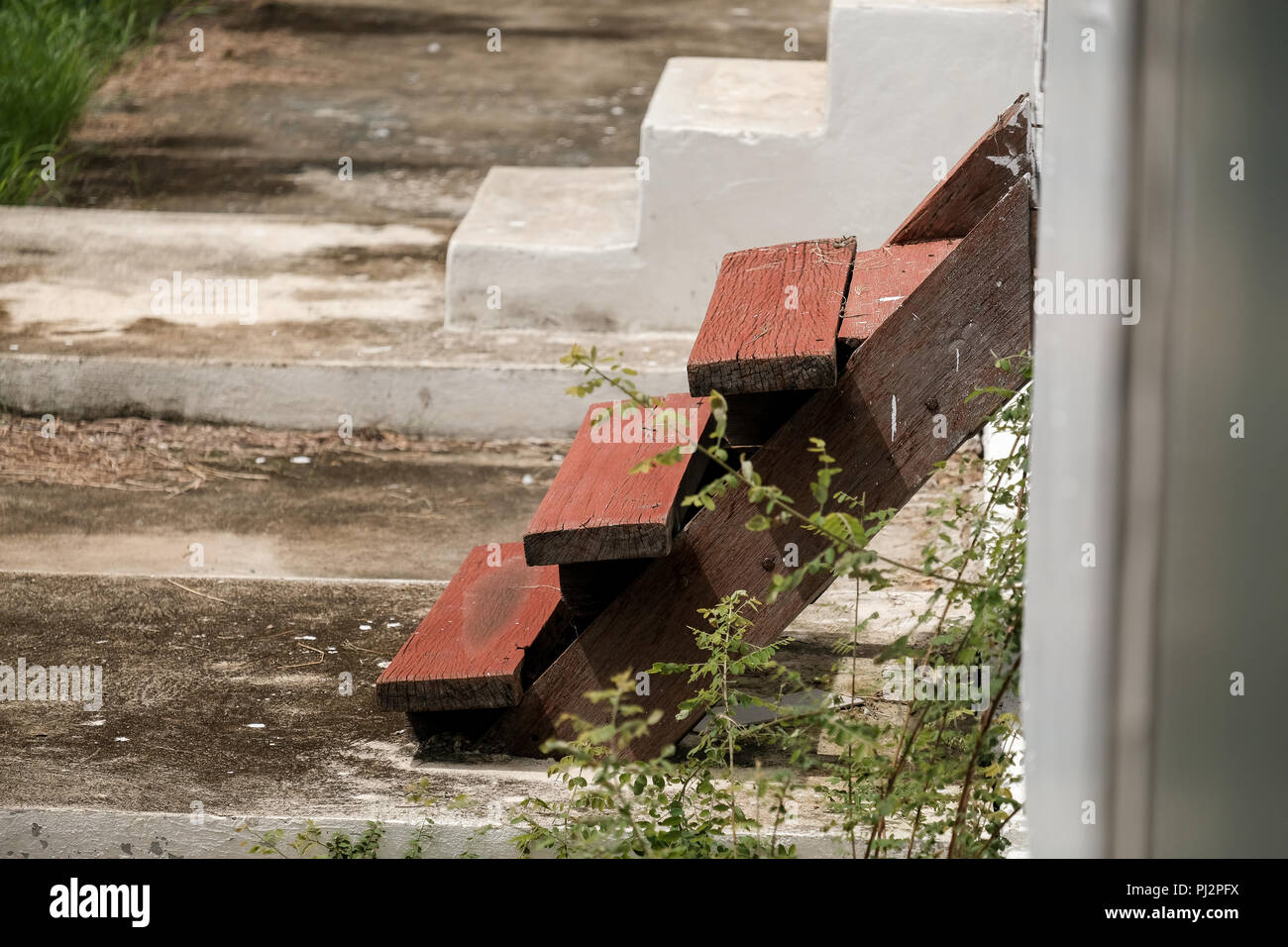 Red wood staircase Stock Photo - Alamy