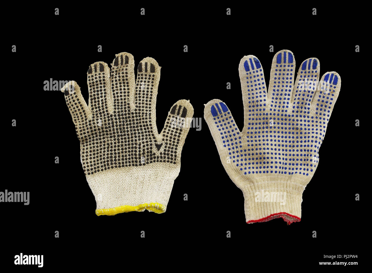 working gloves, with colored rubber dots, black background, with ...