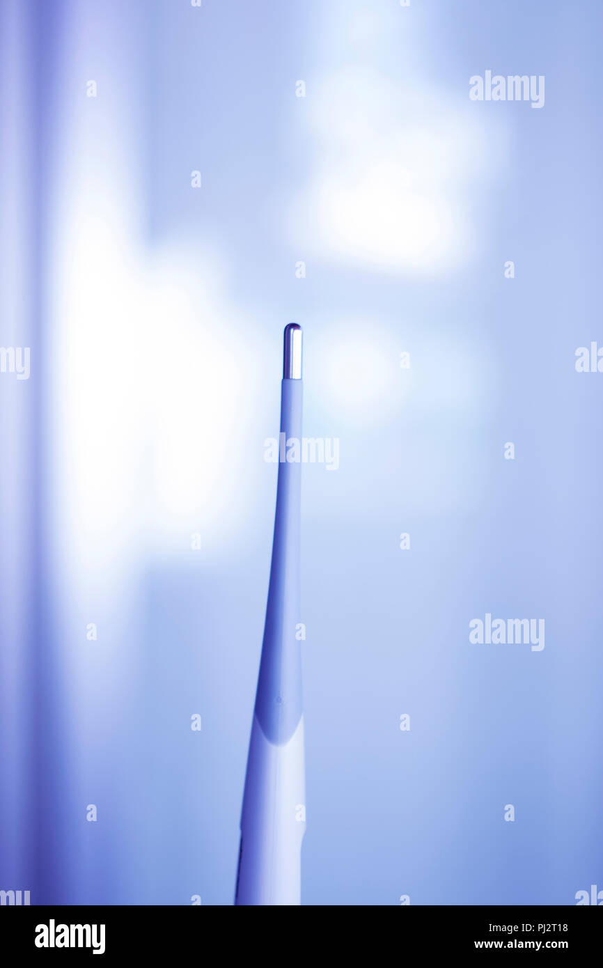 Digital medical thermometer instrument used by doctor or nurse to ...