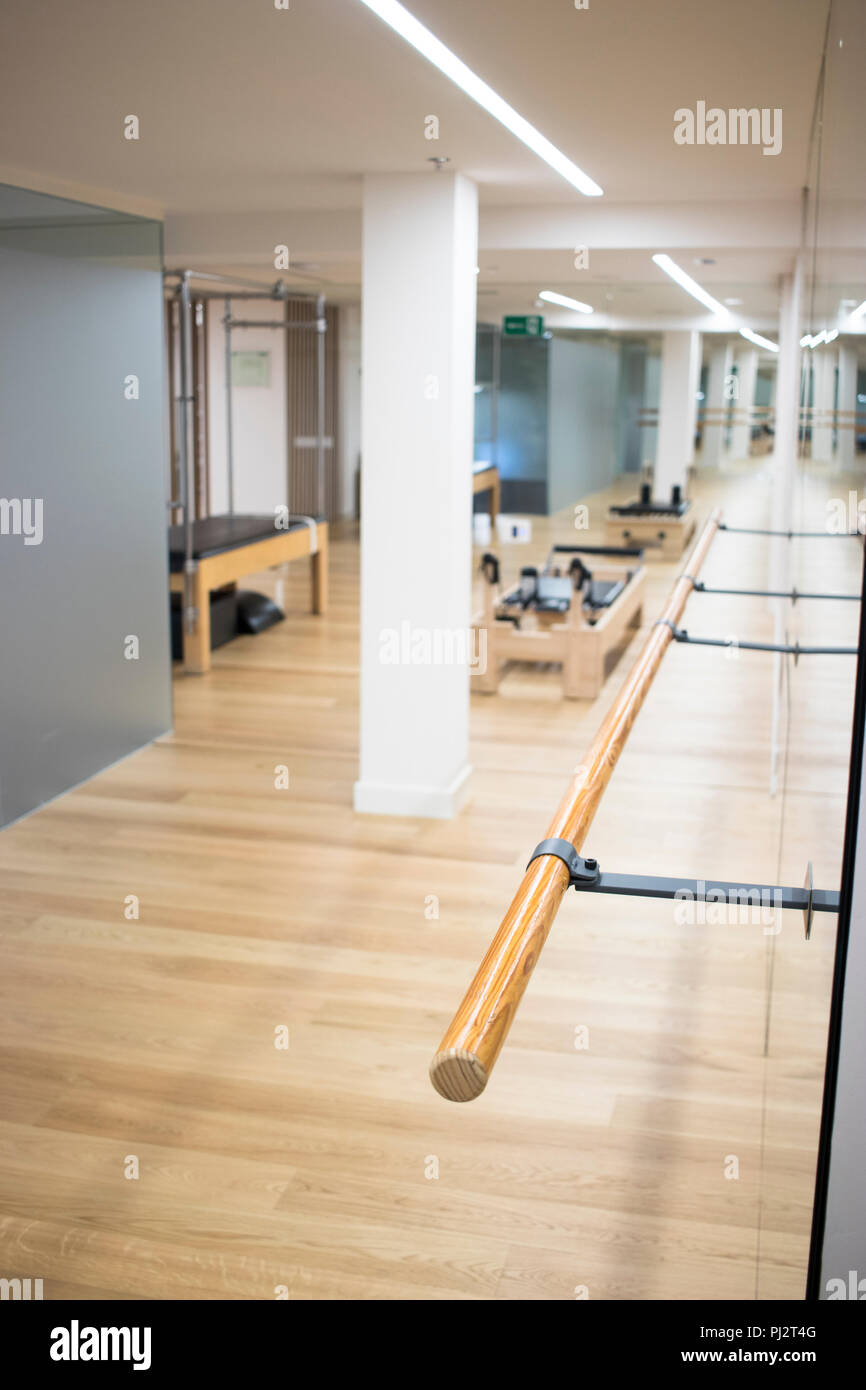 Pilates fitness studio gym room with training dance ballet bar for ...