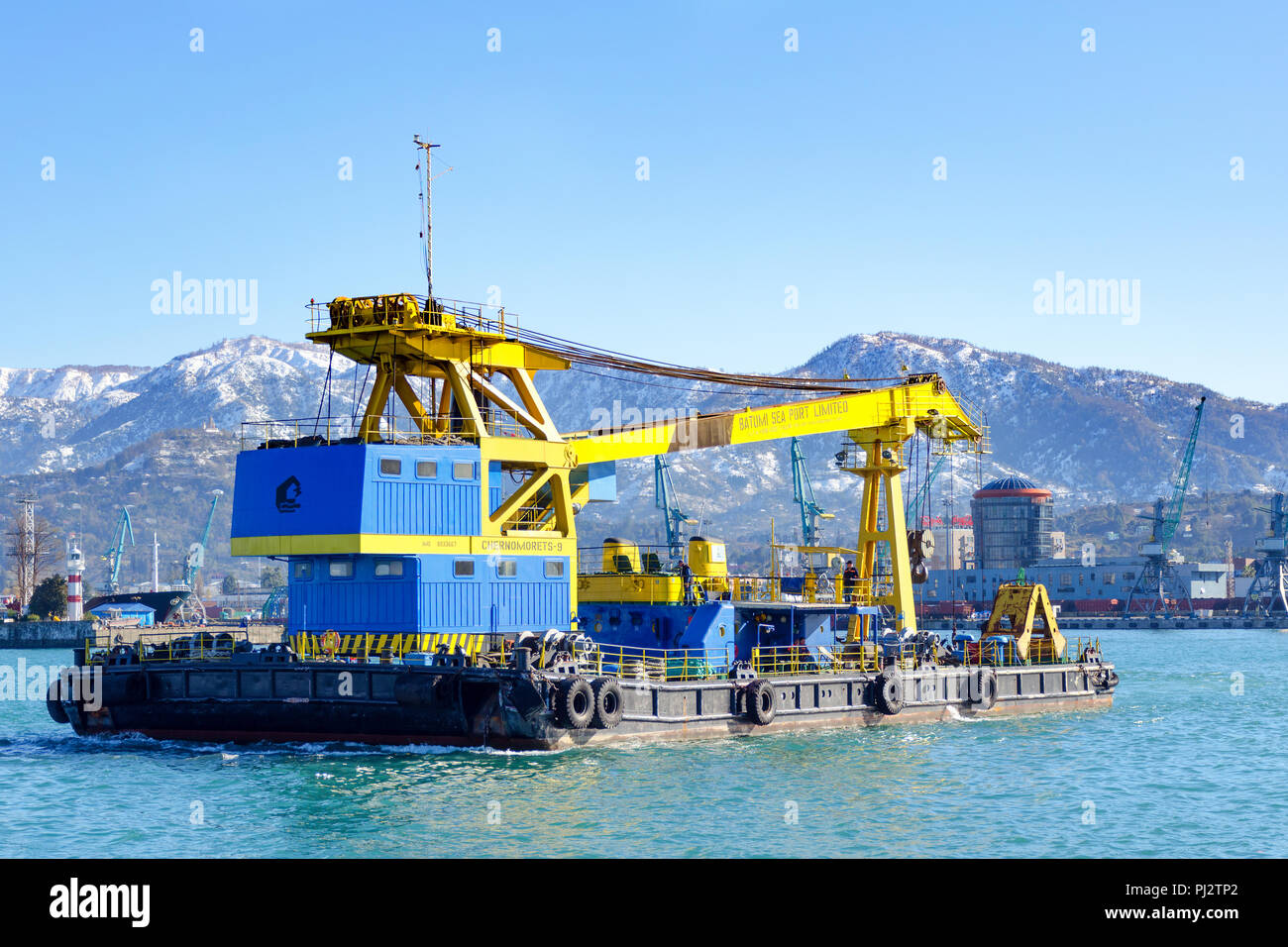 Batumi, Georgia, 2017-11-26: Port floating crane barge, pantone loader ...