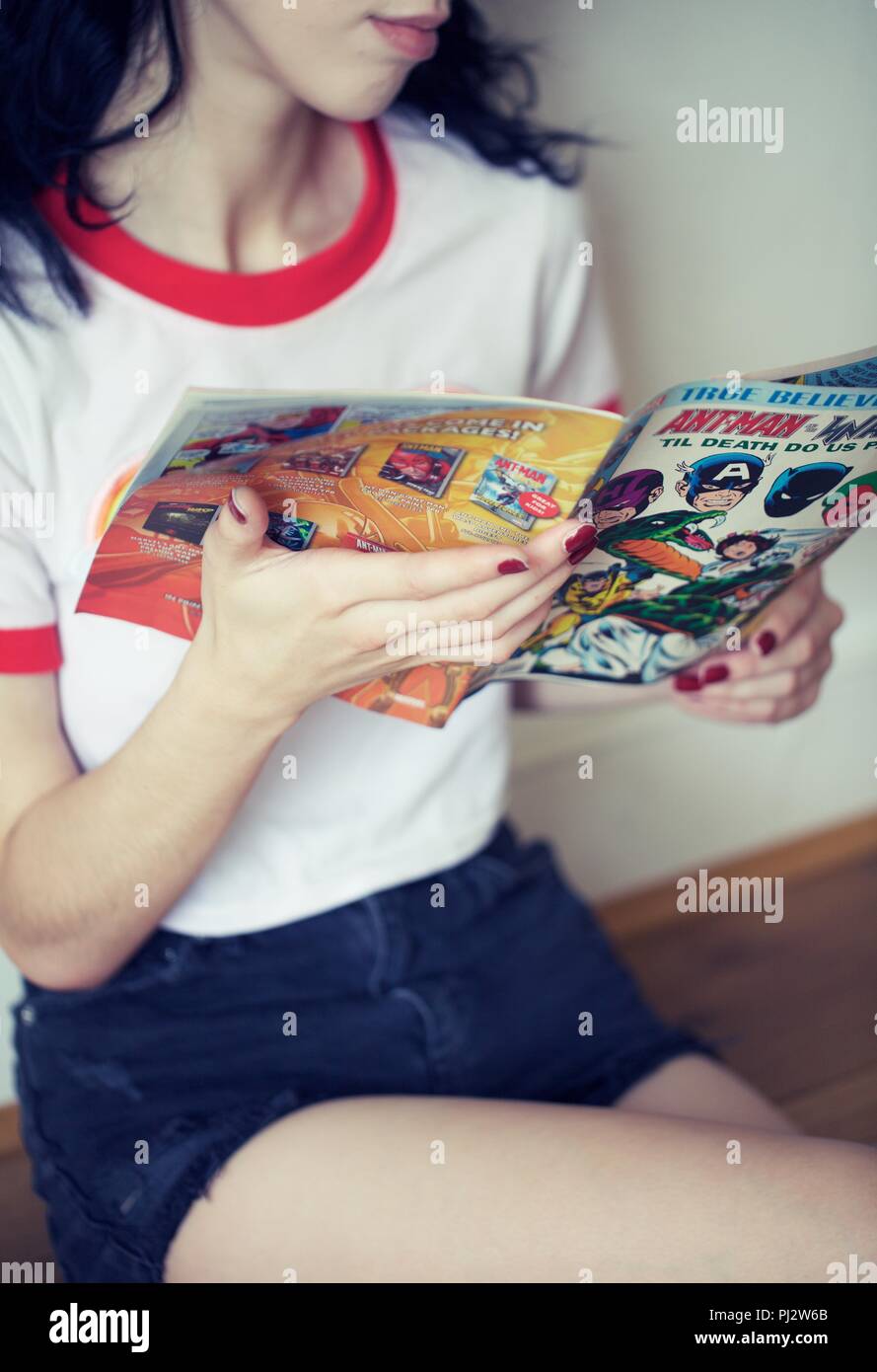 girl reading comics Stock Photo - Alamy
