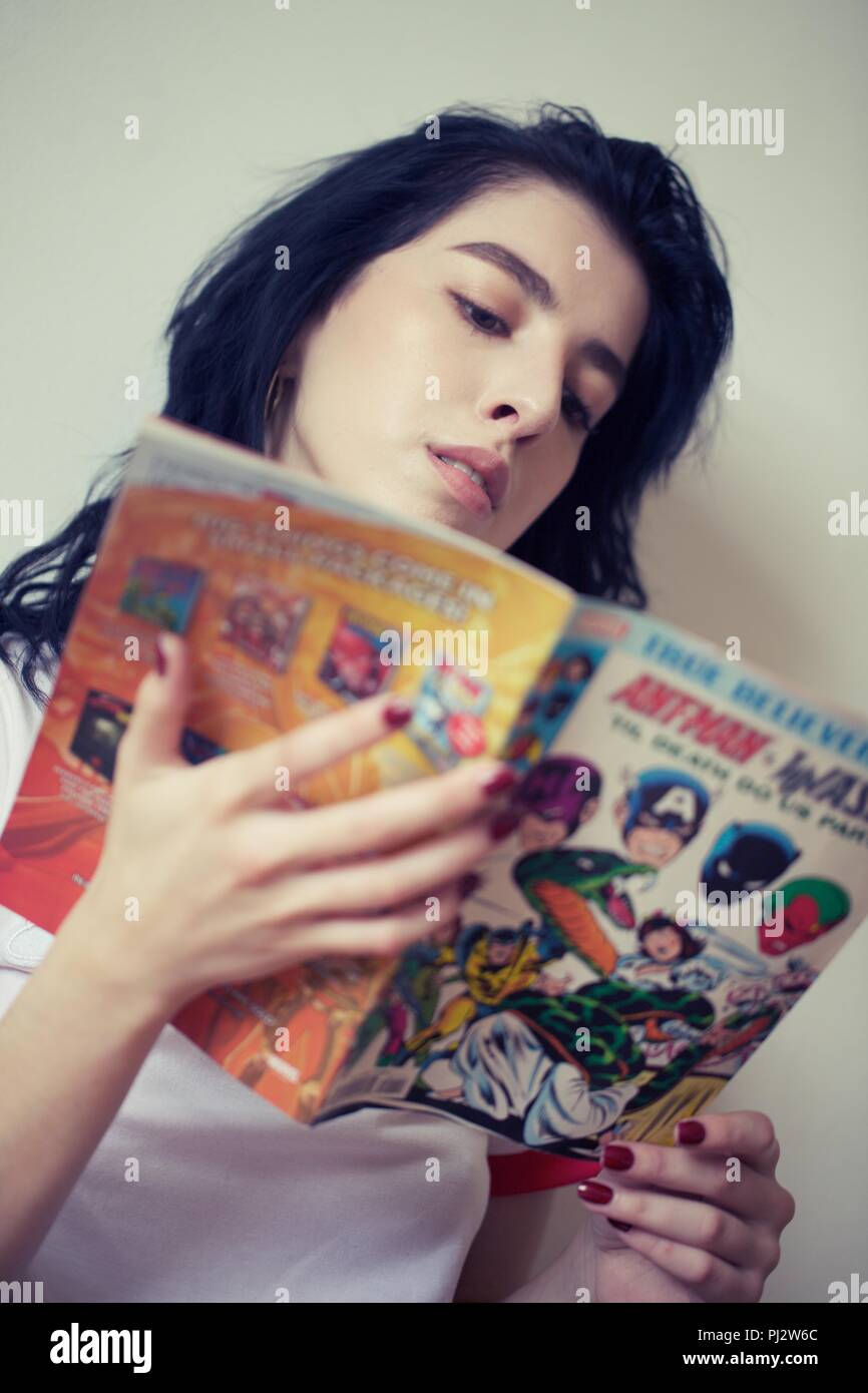 girl reading comics Stock Photo - Alamy
