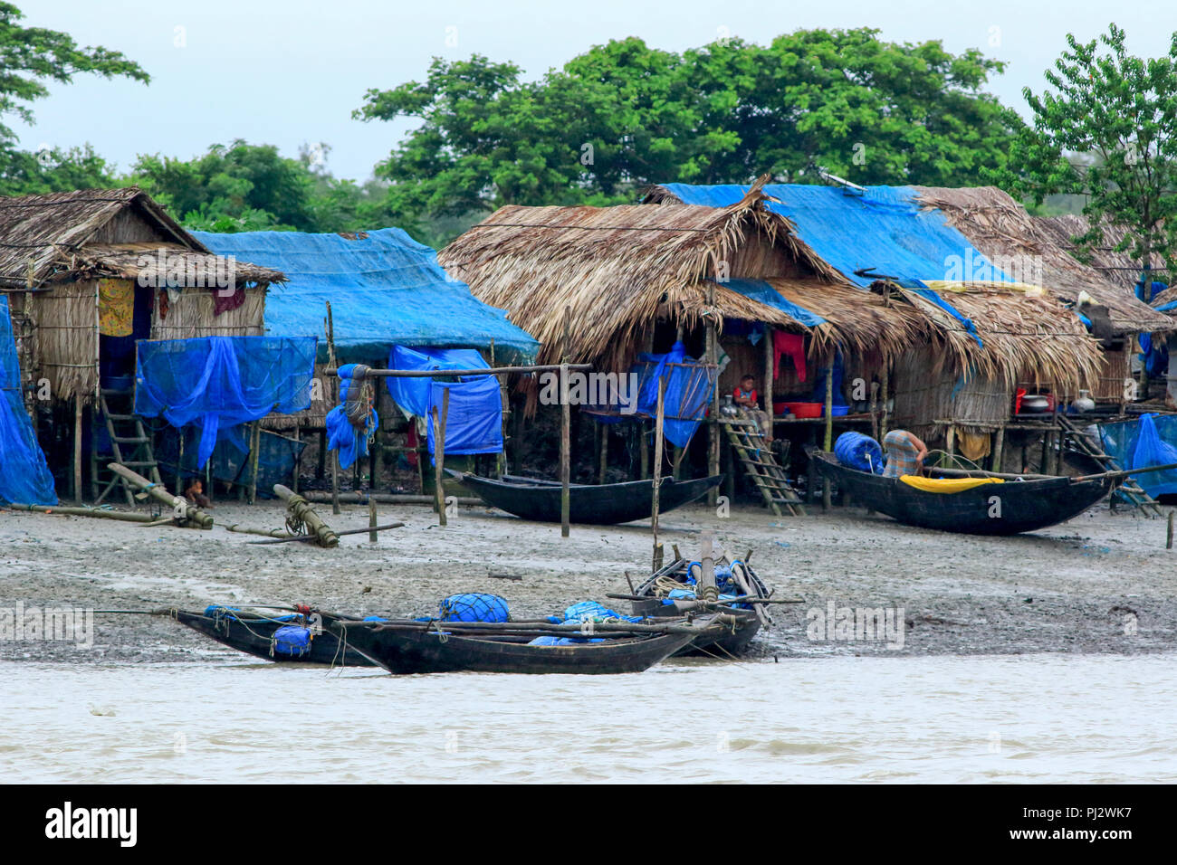 Joymoni fisherman village on the bank of Pasur River near Sundarbans in ...