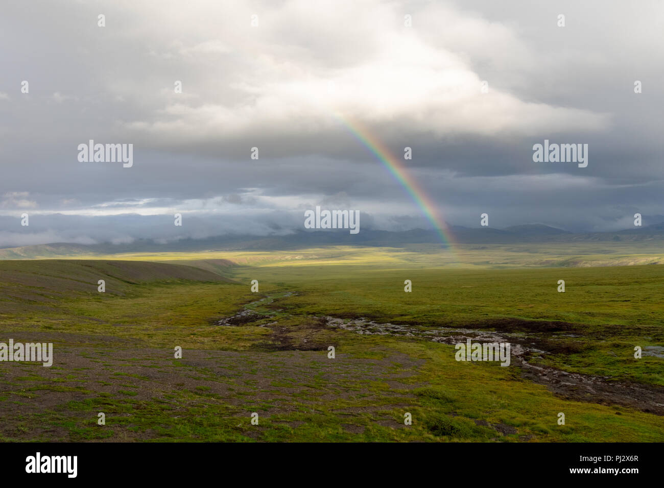 A Beautiful Arctic Rainbow Over The Northwest Territories Tundra Stock ...