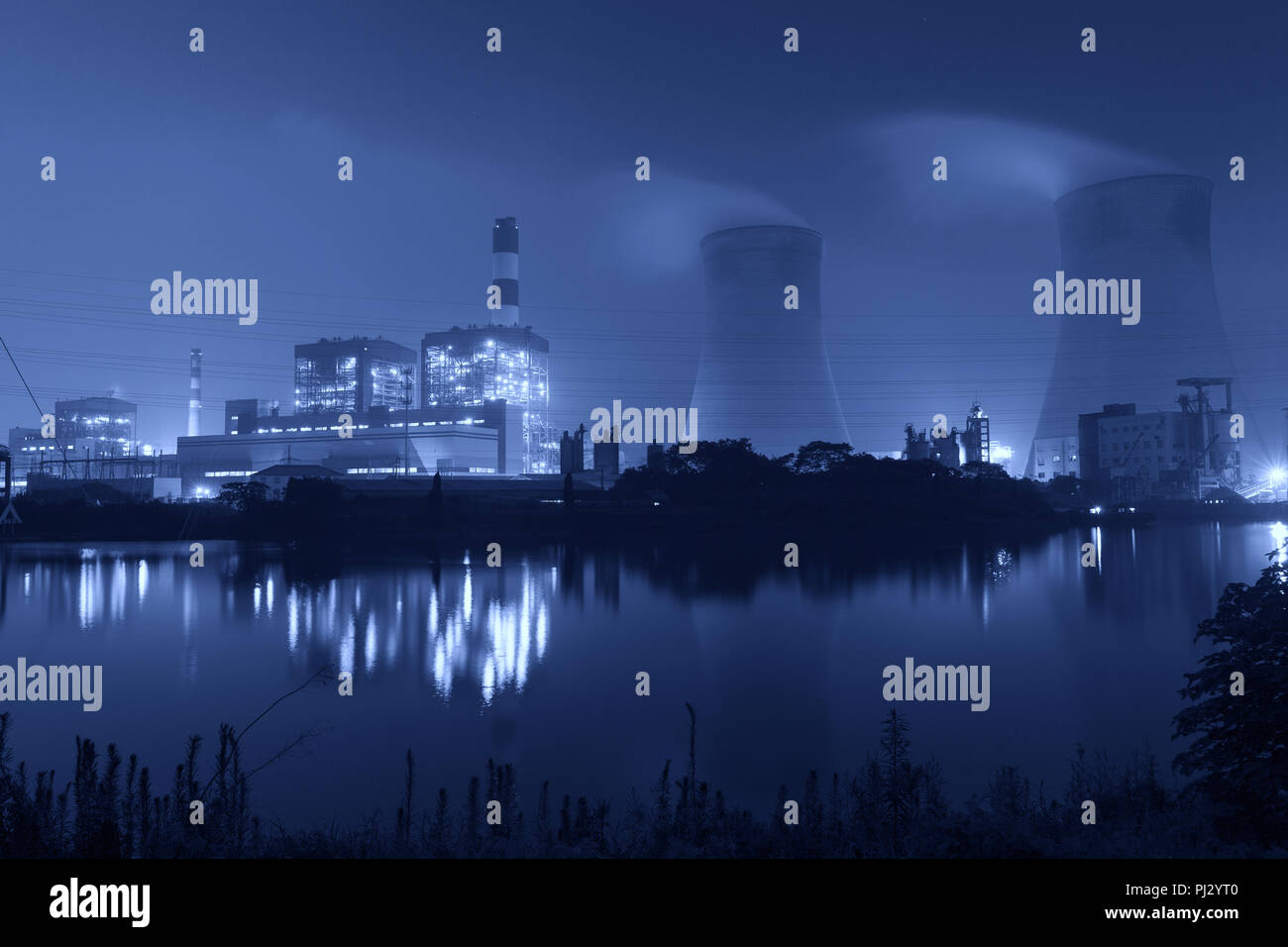 Night view of factory Stock Photo - Alamy