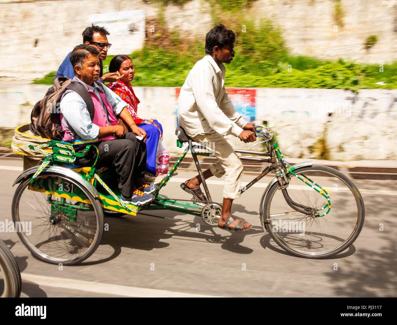 Indian people enjoying a Tuk Tuk ride in Nainital, Uttarakhand, India ...