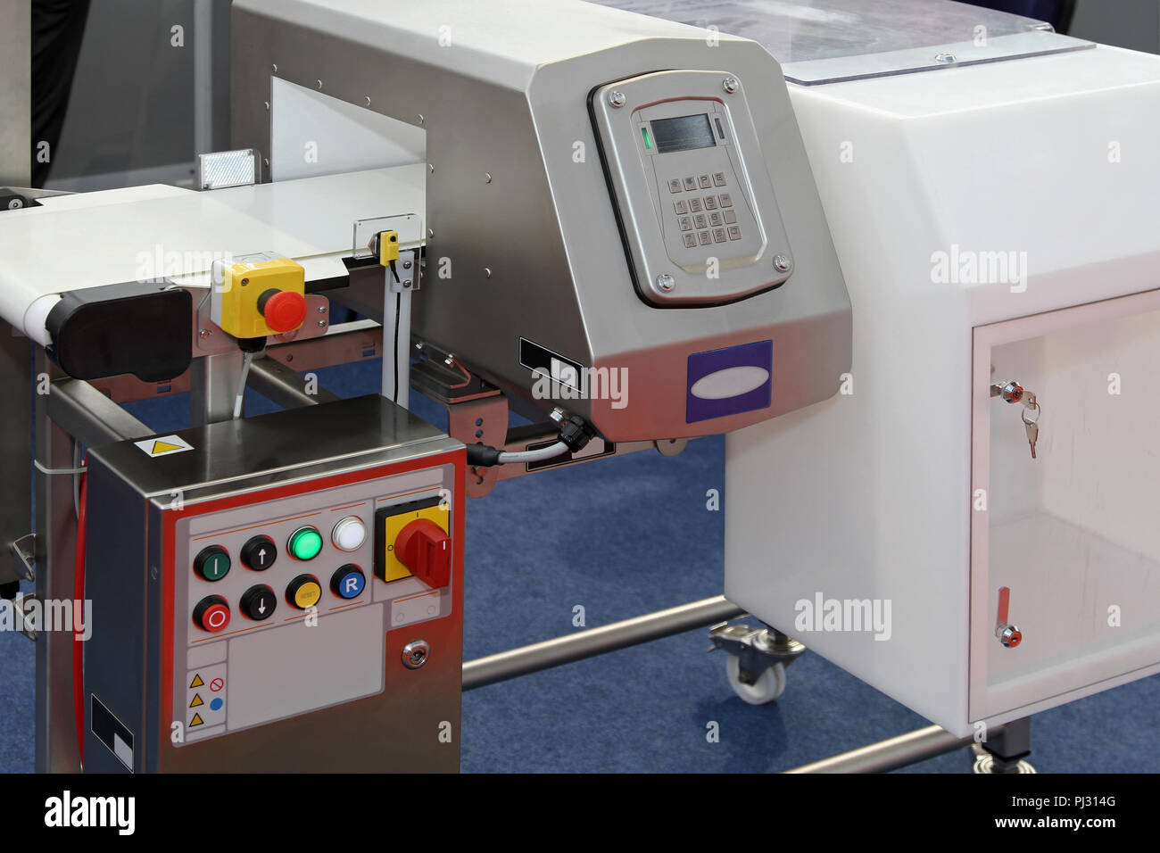 Metal detector at production line in food factory Stock Photo - Alamy