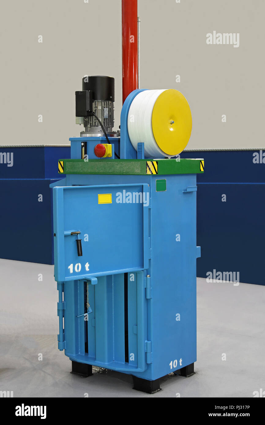 Hydraulic baling press machine for compacting plastic waste Stock Photo ...