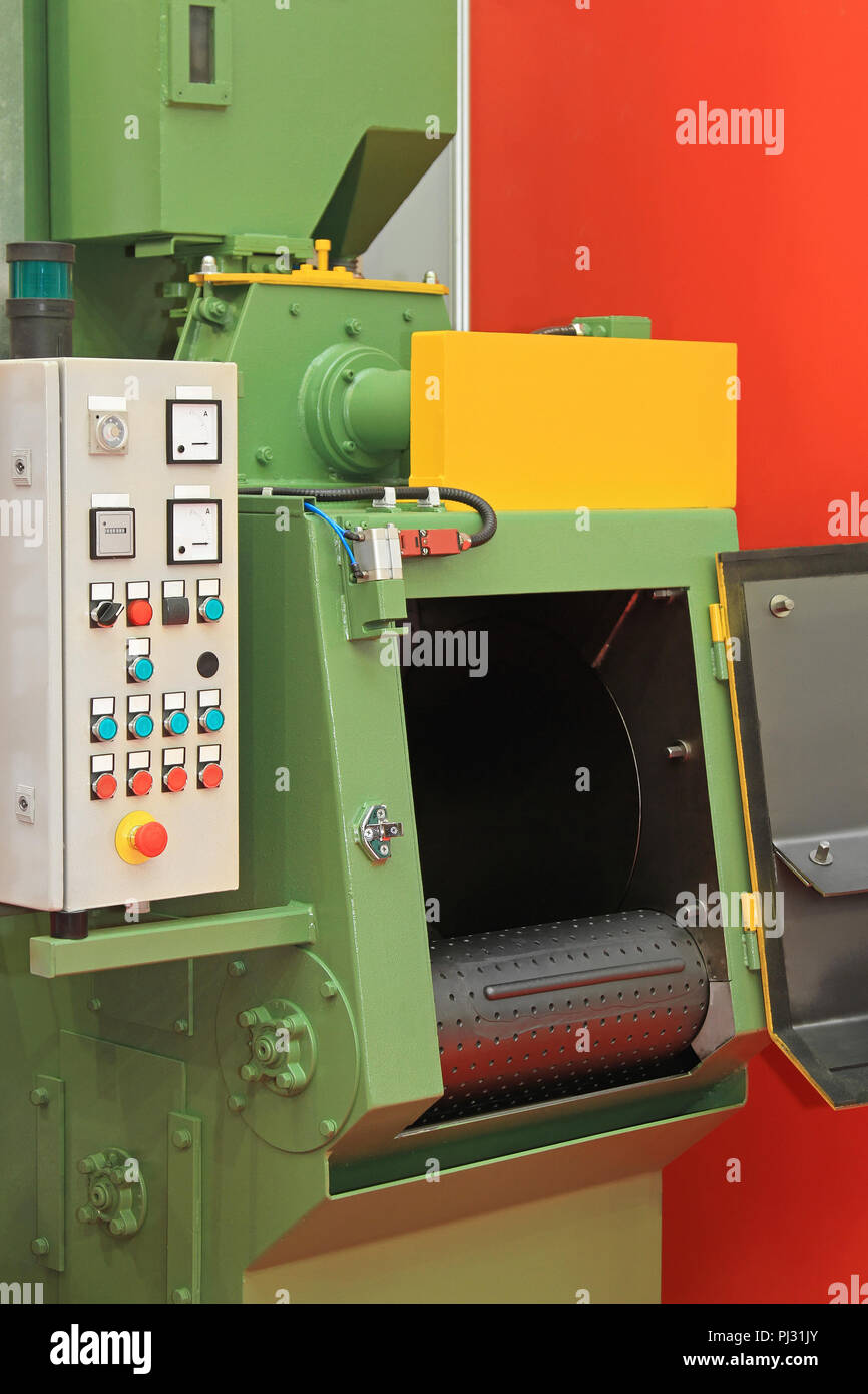Automated sand shot blaster industrial equipment machine Stock Photo ...