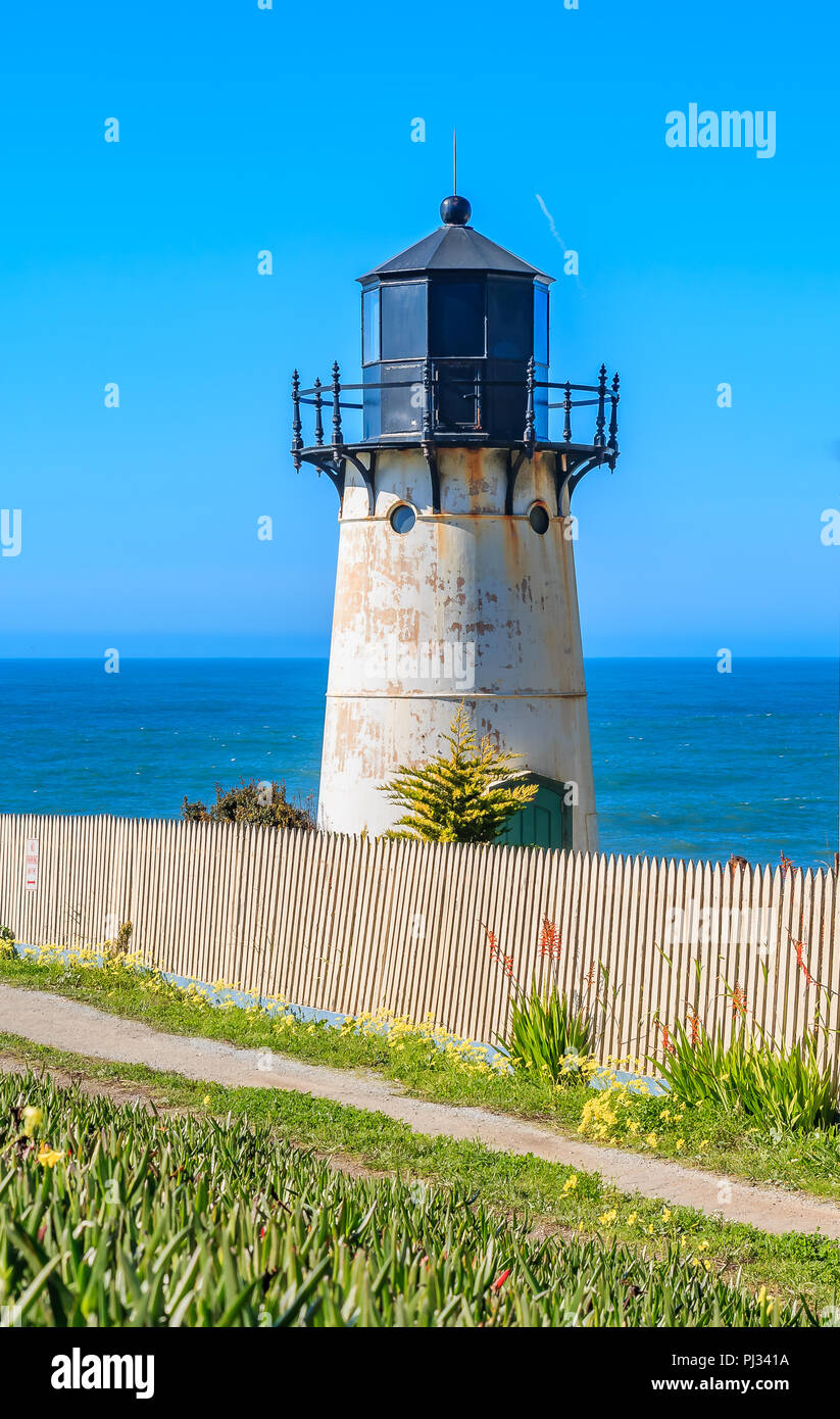Point Montara Lighthouse and fog signal with spring flowers on the ...