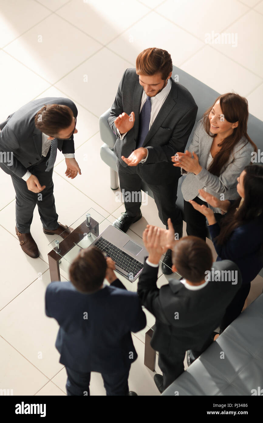 Female colleagues high fiving hi-res stock photography and images - Alamy