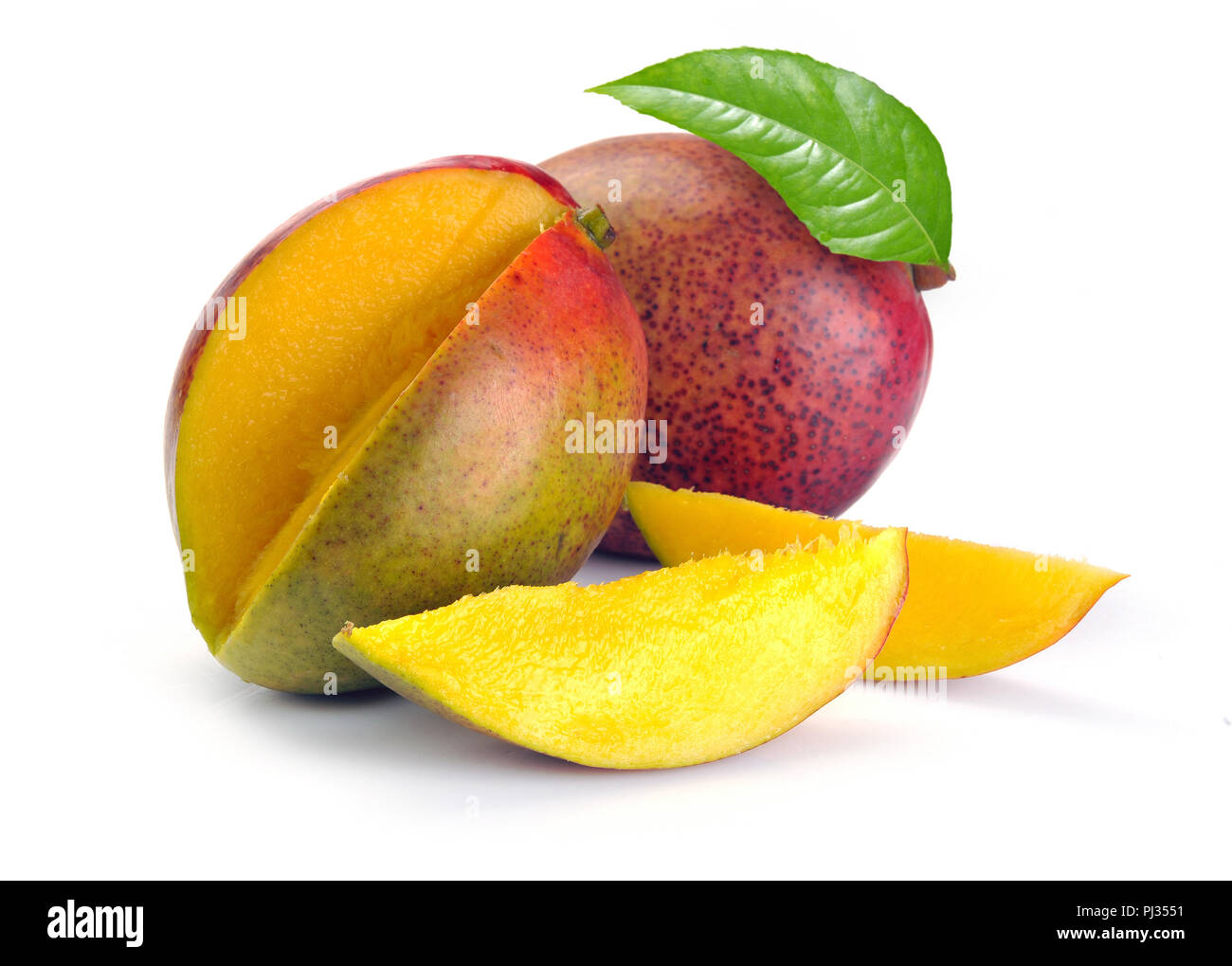 Mango with section on a white background Stock Photo - Alamy