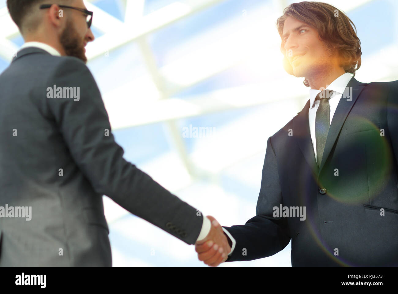 Business handshake and business people Stock Photo - Alamy