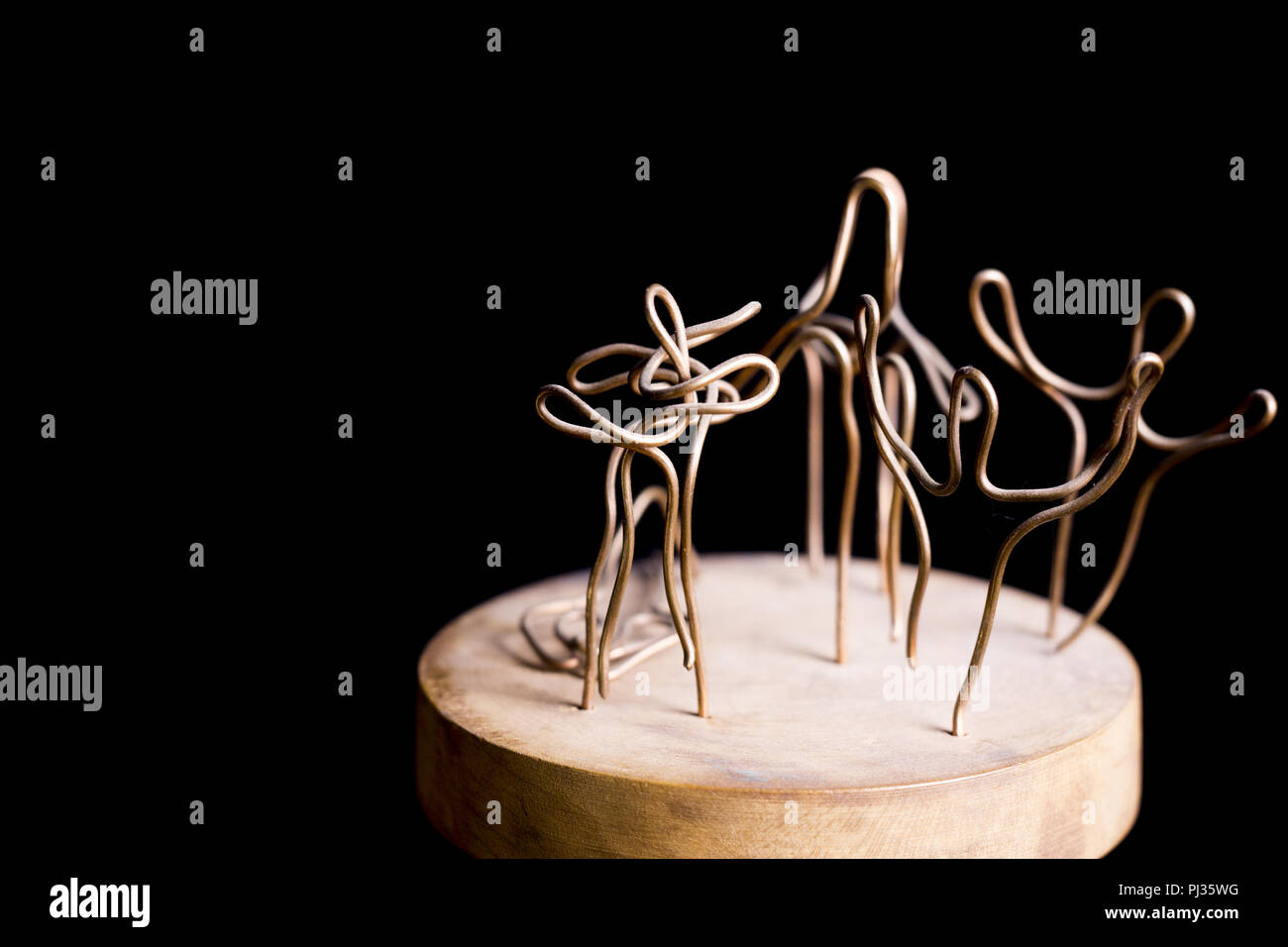 Modern sculpture made with recycled materials. Similar to human ...