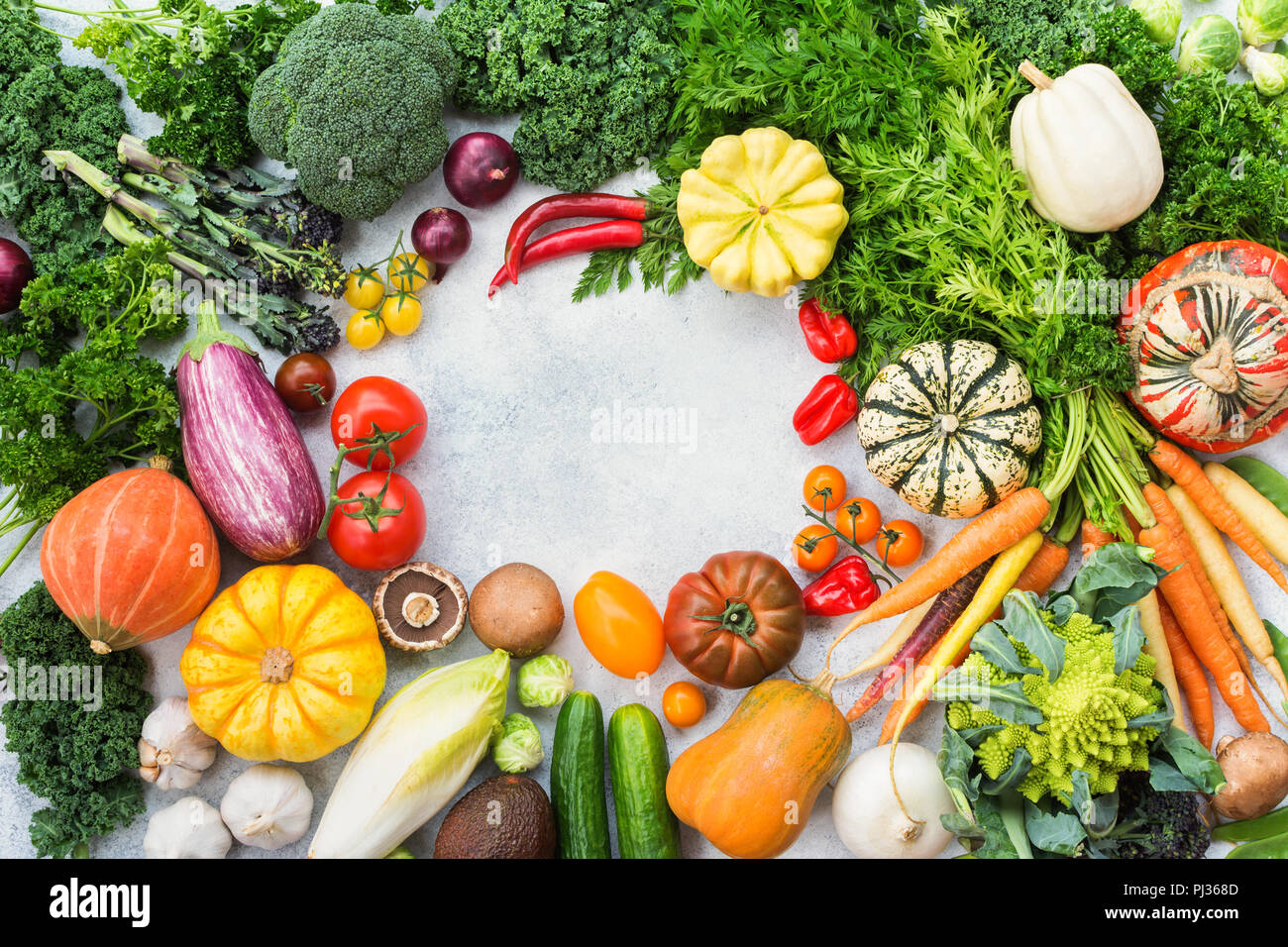 Fresh farm produce, colorful frame made of organic vegetables and herbs ...