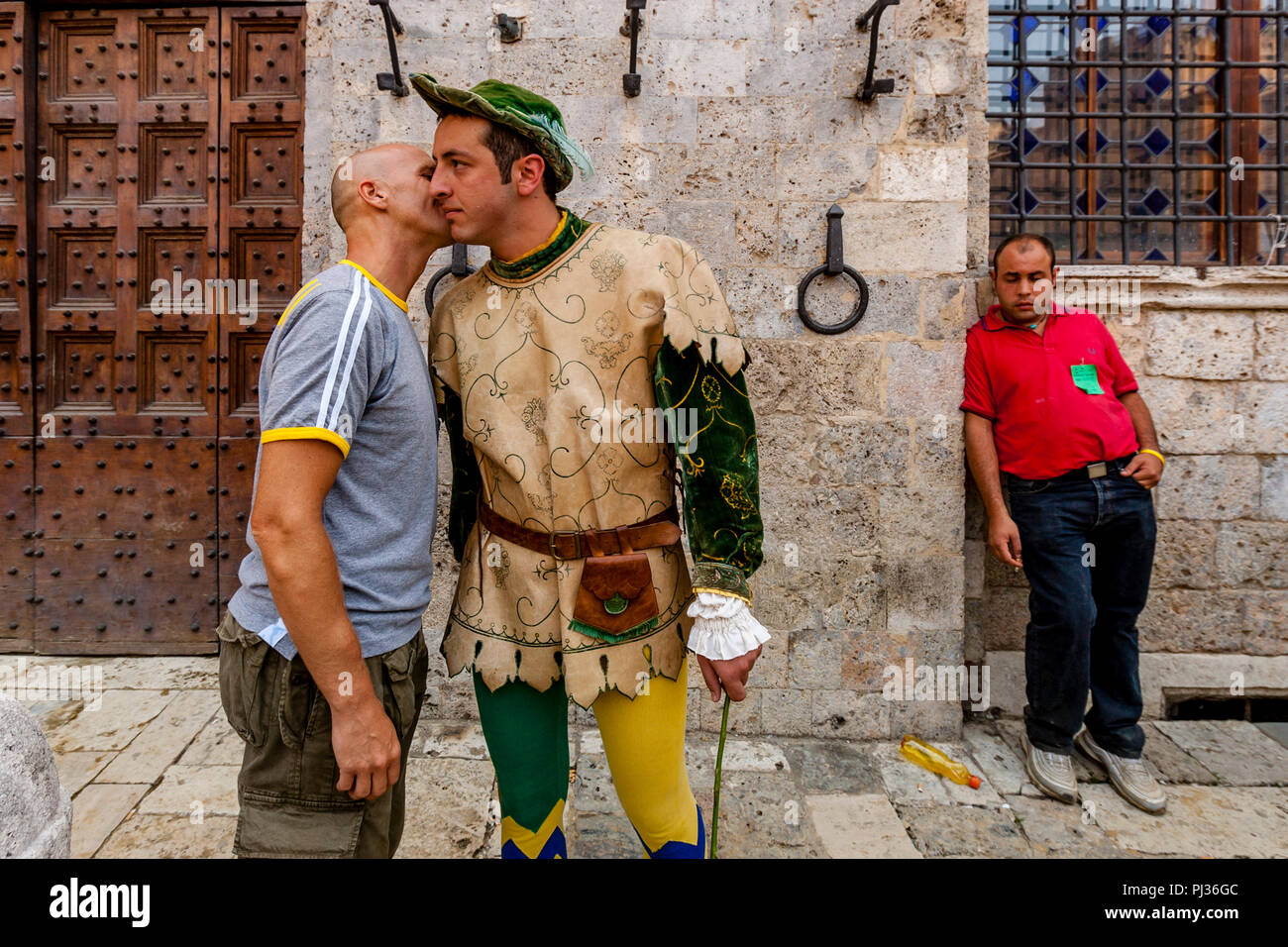 Members Of The Bruco (Caterpillar) Contrada Wait for The Assignment Of ...