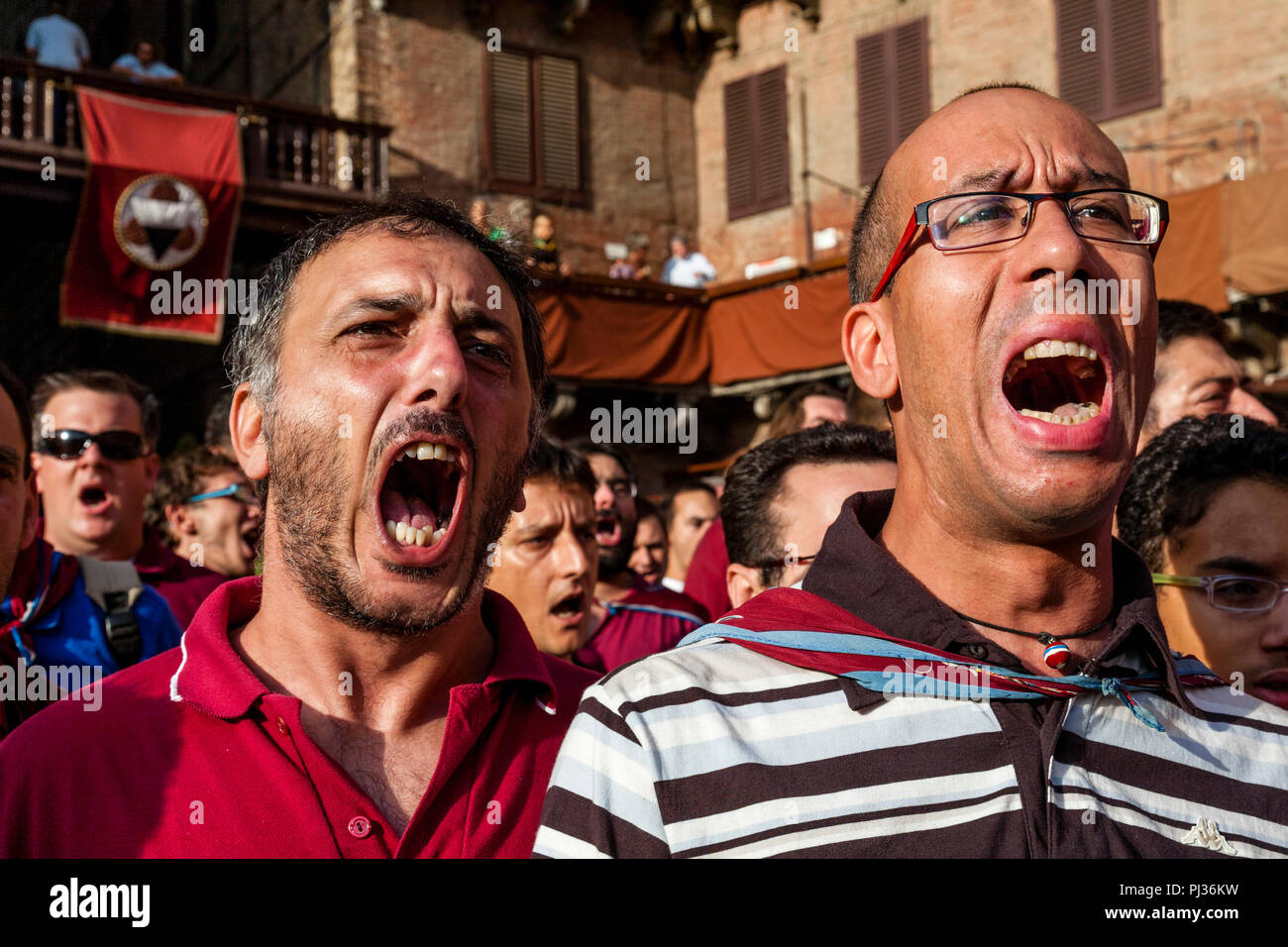 Contrada Members From The Torre (Tower) Contrada Arrive In The Piazza ...