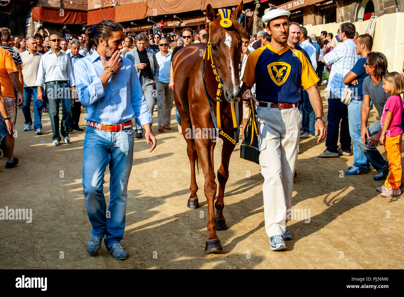 The Grooms and Horse From The Aquila (Eagle) Contrada Arrive In The ...