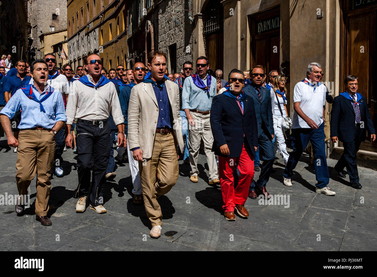 Members Of The Nicchio Contrada Return To Their District Singing ...