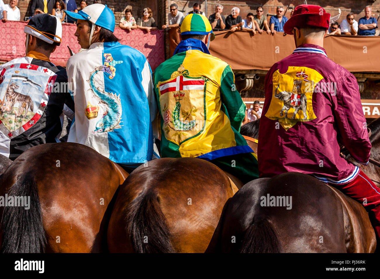 Jockeys Dressed In Colourful Costumes That Represent Their Contradas ...